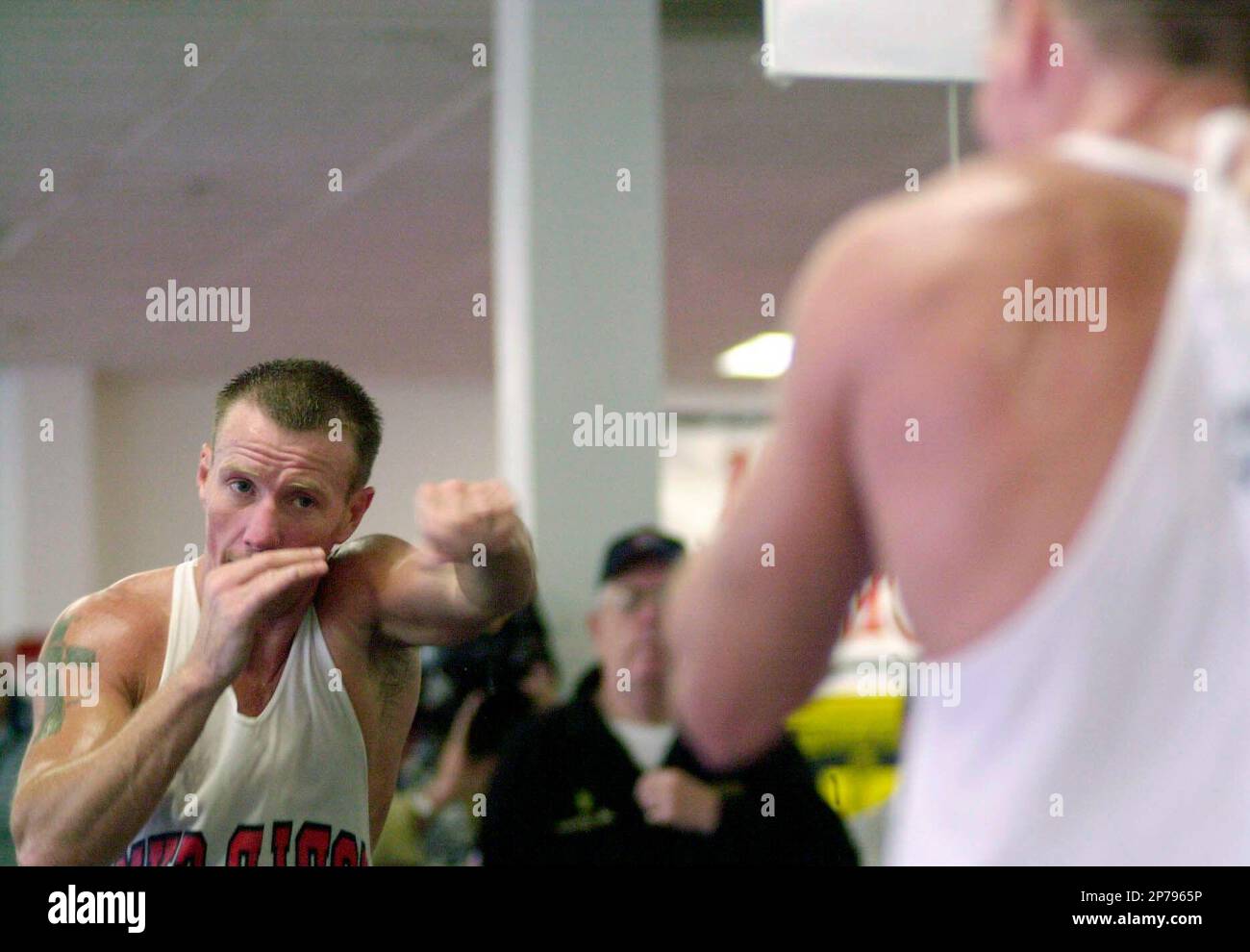 Micky Ward's shadow is shown boxing in the mirror at the World Gym in ...