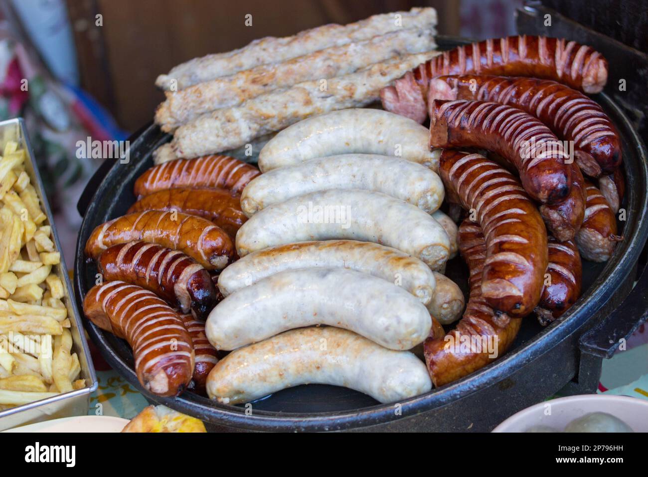 On the showcase, hot sausages are sold on the market Stock Photo - Alamy