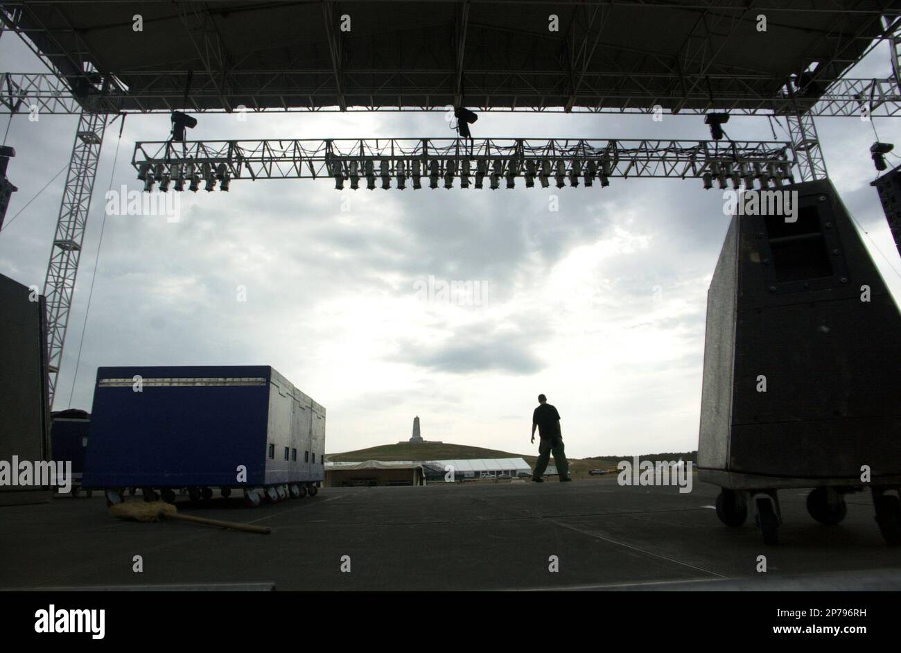 Lights are erected on the 108-by-40-foot stage erected Wednesday at ...