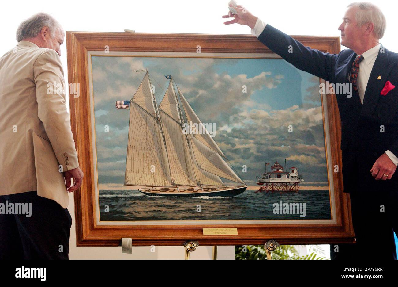 Maritime artist John MacLeod, left, and Stephen Johnsen, chairman of ...