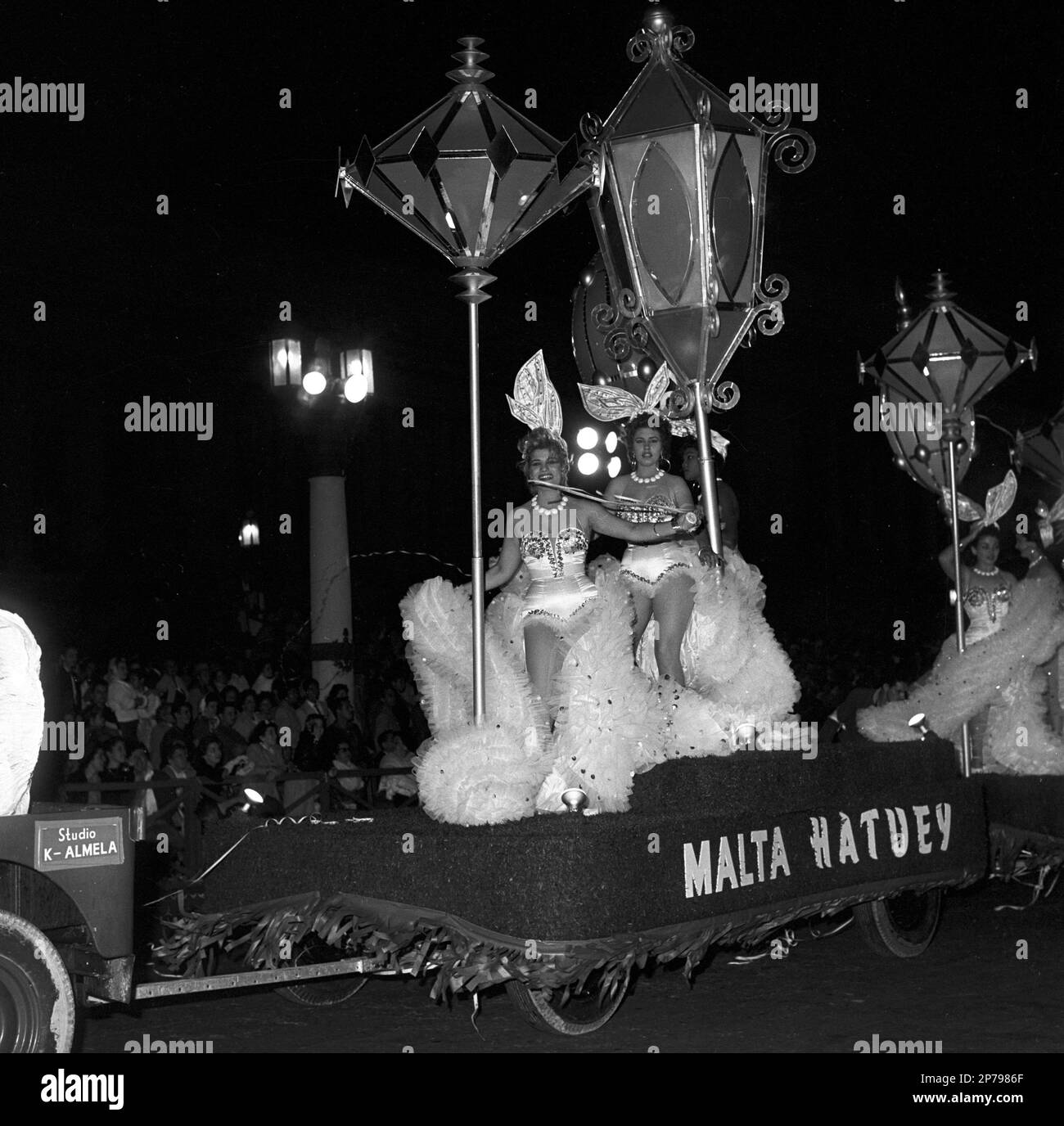 Women pose on a parade float during Carnival celebrations in Havana ...