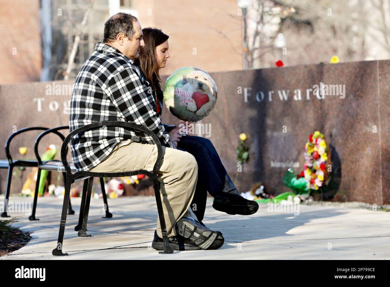 Greg Zanis, left, of Sugar Grove, and Ashley Cibulka, of Itasca, sit on ...