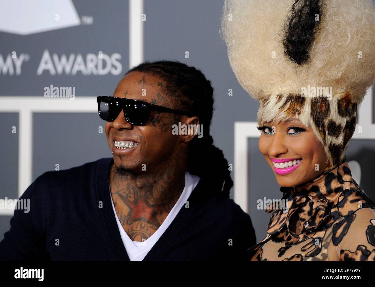 Little Wayne, left, and Nicki Minaj arrive at the 53rd annual Grammy ...