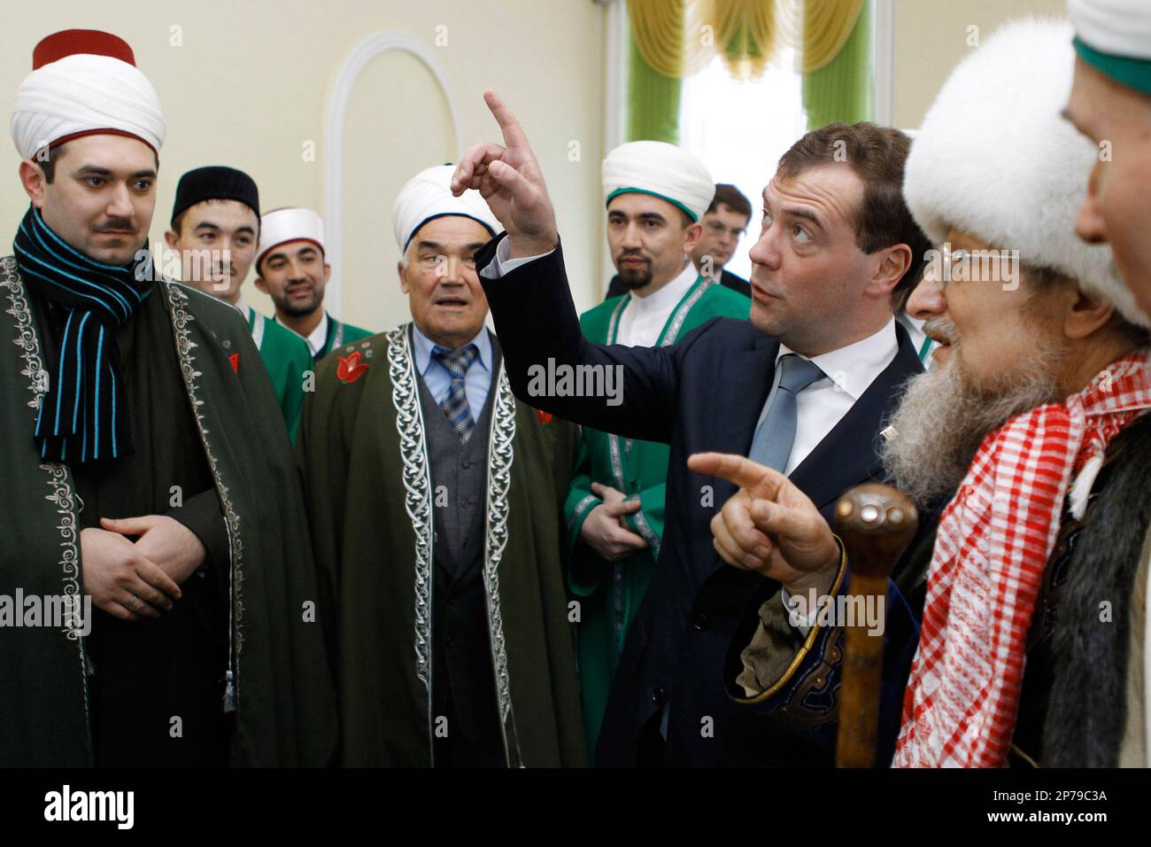 Russian President Dmitry Medvedev, third right, speaks to Supreme Mufti ...