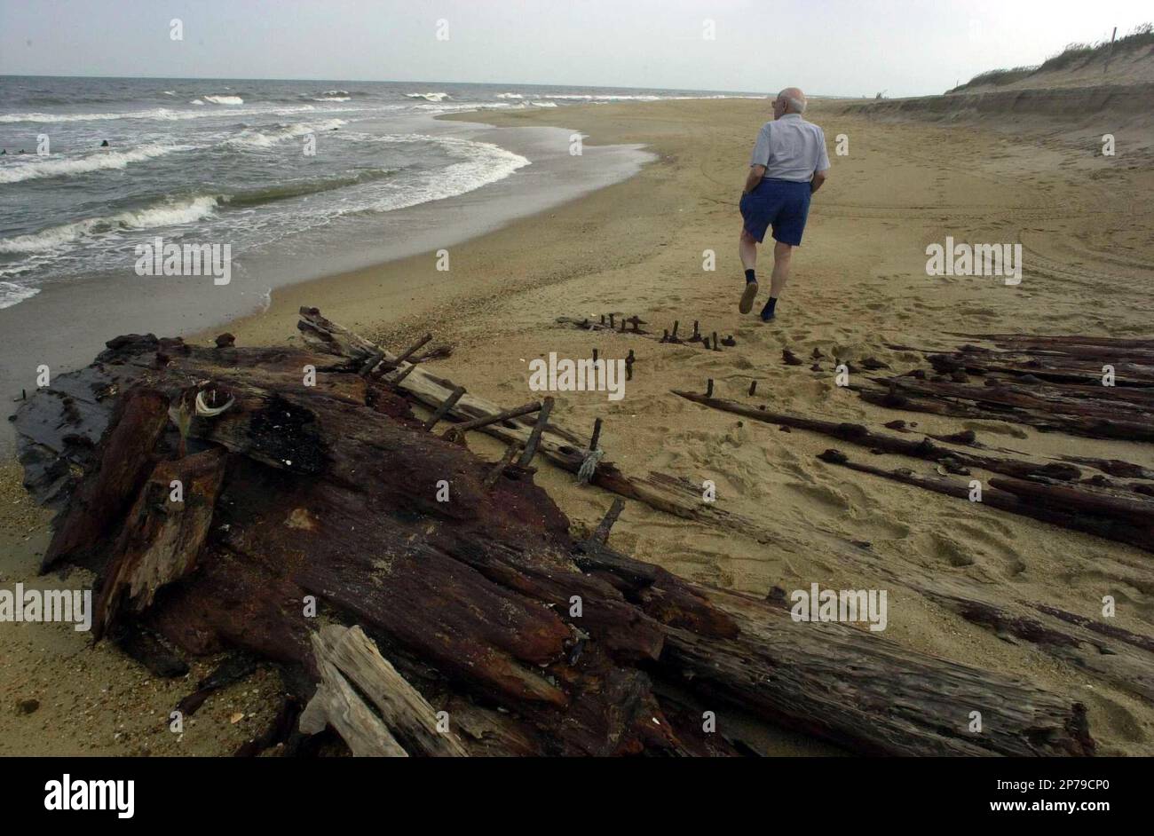 Outer Banks author and historian David Stick walks Friday through the ...