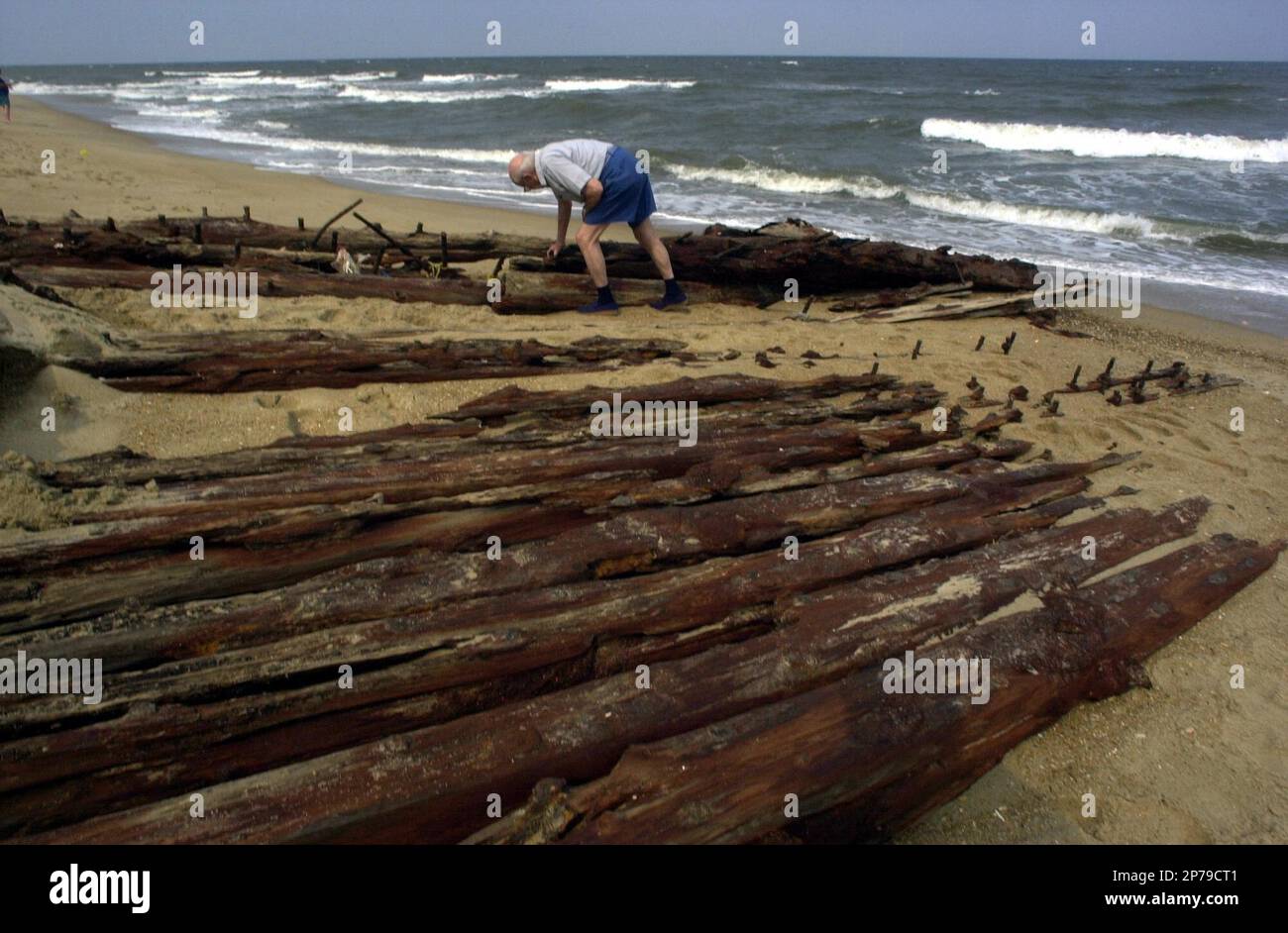 Author and historian David Stick surveys the wreck of the Irma in Kill ...