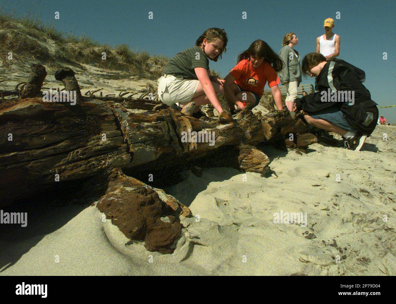 Eighth grade student archaeologists, from left, Jennifer Reavis, Kathy ...