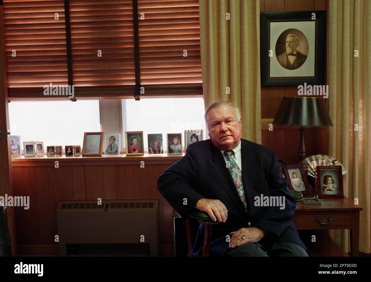 John L. Roper III, chairman of NORSHIPCO, proudly sits at his office ...