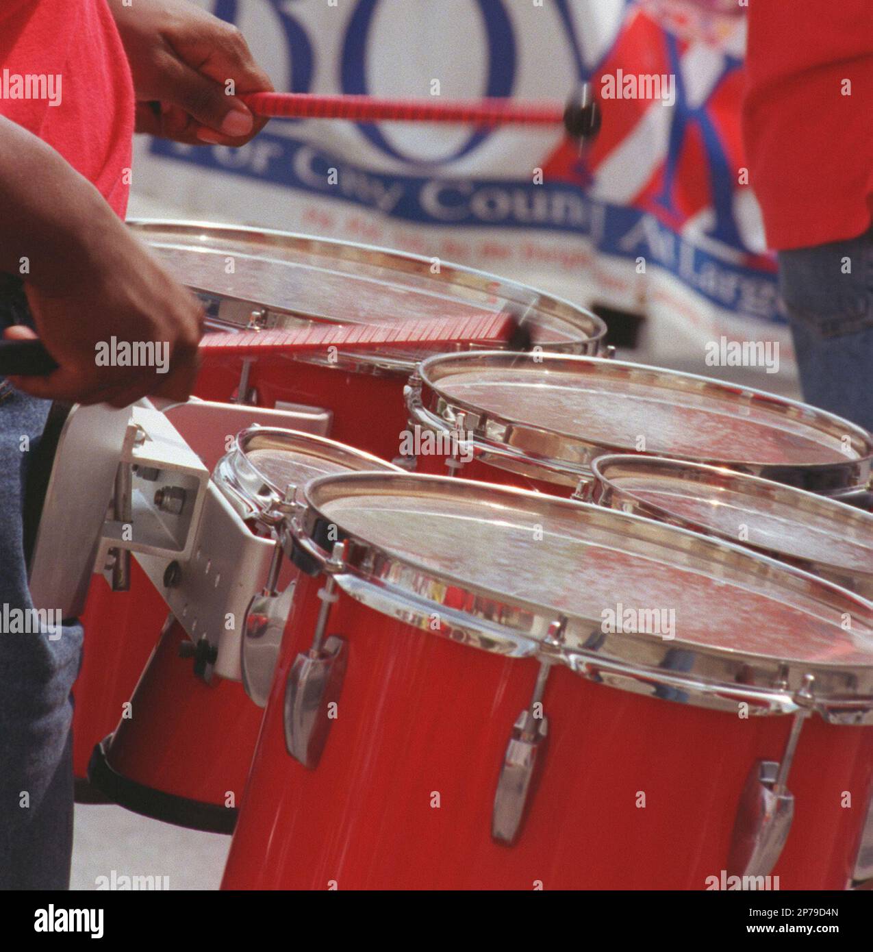 A drummer with the Jack Yates High School marching band keeps the tempo ...