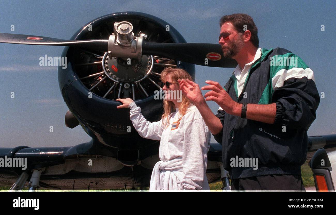 WWII Warbird pilots Gina Moore (left) and Steve Laramore (right) talk ...