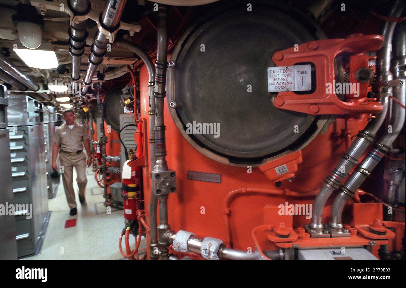 Master Chief Jeffrey Nihiser, left, in the second level of the missile ...