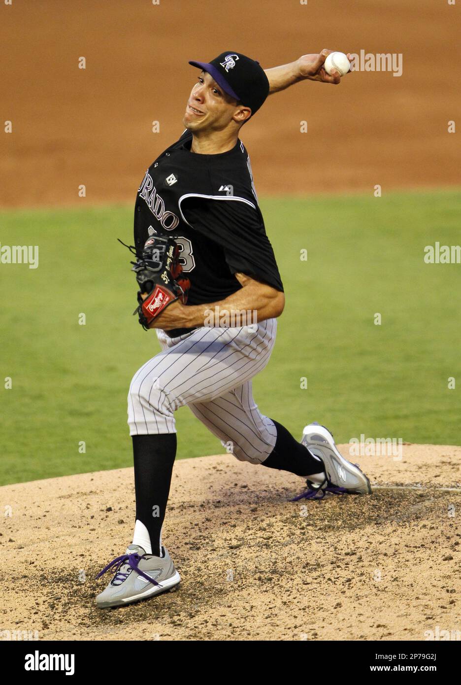 Colorado Rockies Ubaldo Jimenez pitches in a game against the Florida ...