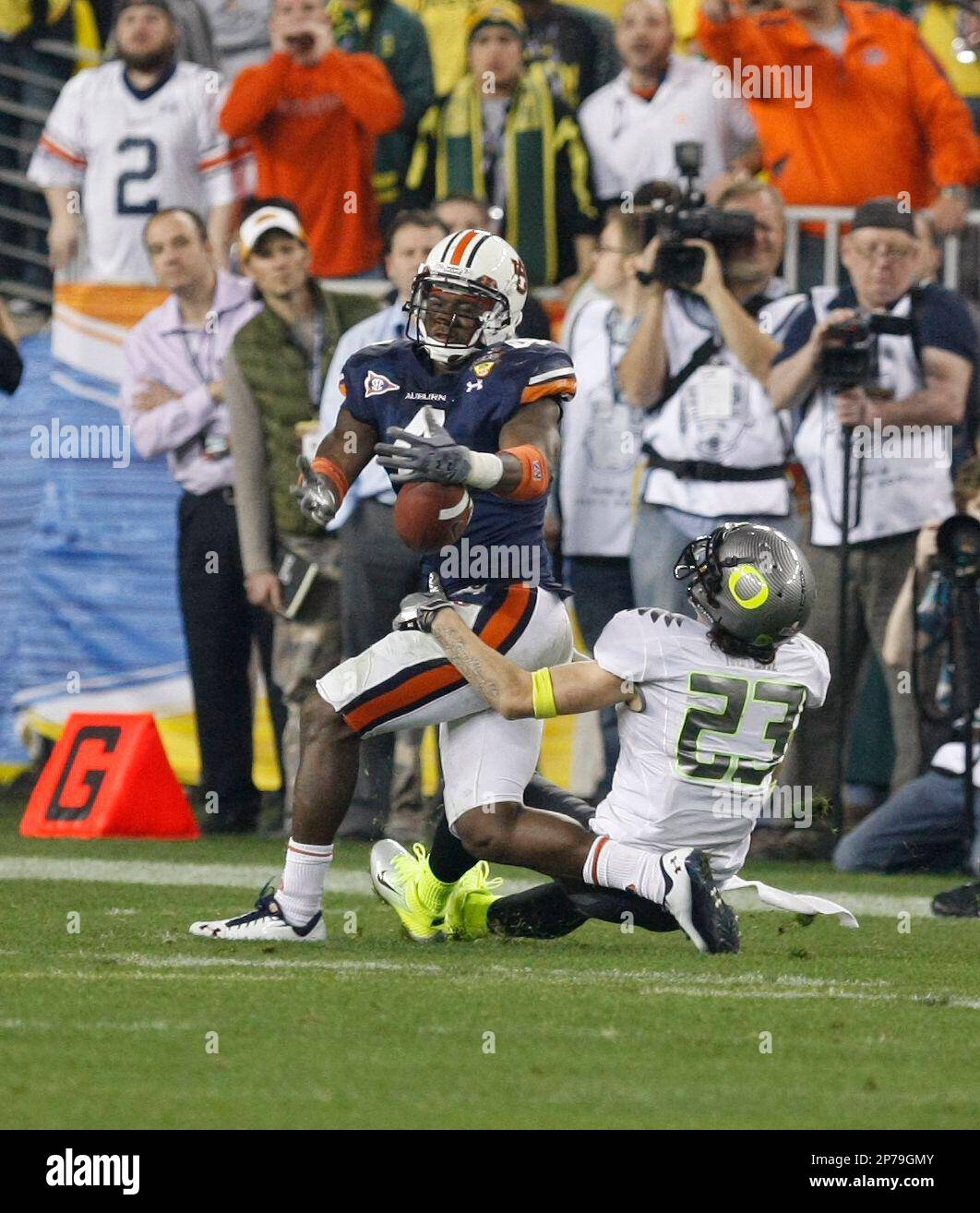 Auburn Tigers safety Zac Etheridge breaks up the pass on Oregon Ducks ...