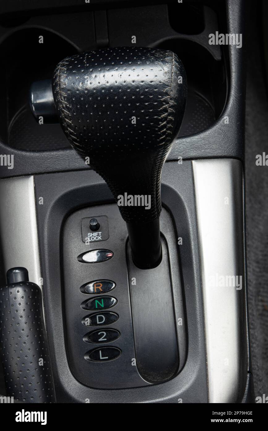 Generic car automatic gearbox transmission selector lever close up shot ...