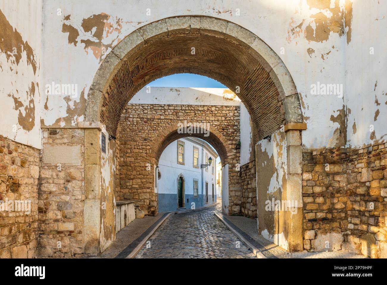 Resting Arch in medieval walls is one of 4 entrances to the old town in ...