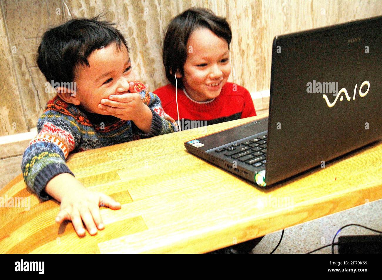 From left, Raj Jarrod Kundargi,4, and his brother, Anand F, 7, from ...