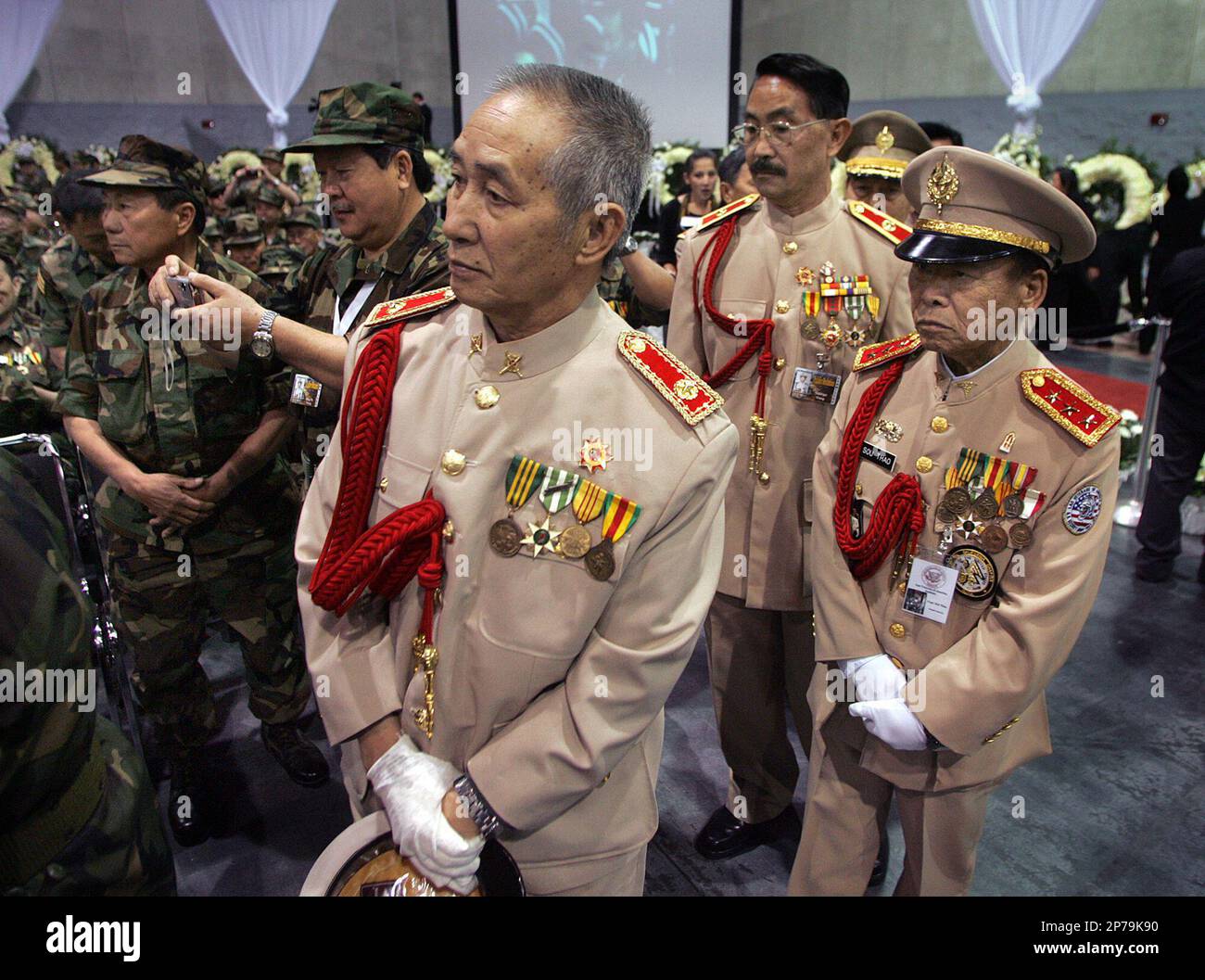 Hmong military veterans gather in the Fresno Convention Center before ...