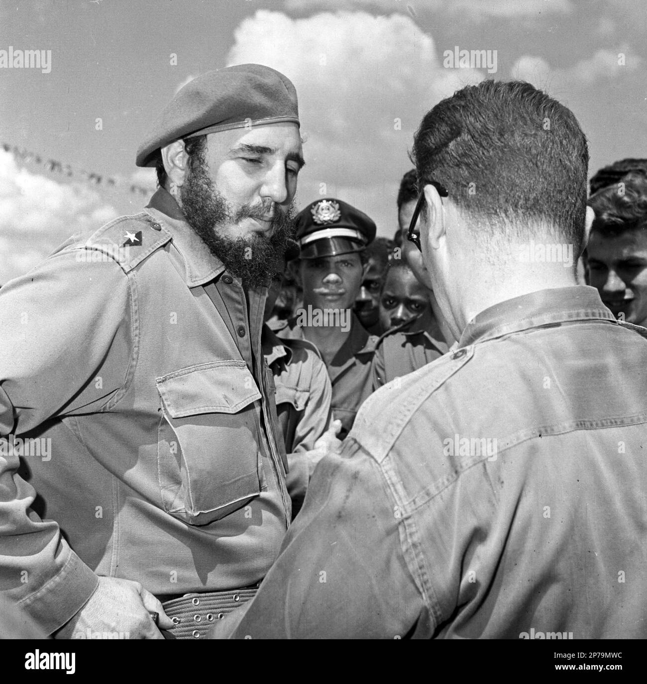 Cuban leader Fidel Castro, left, speaks to an unidentified man during ...