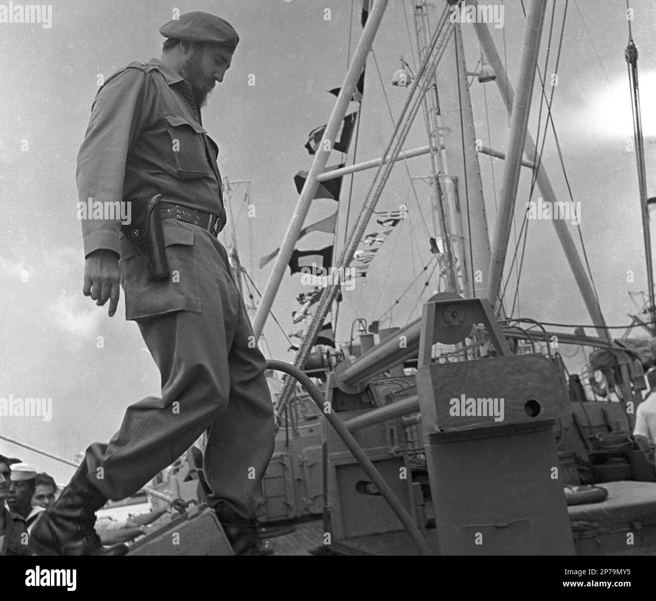 Cuban leader Fidel Castro boards a ship during a welcoming ceremony for ...