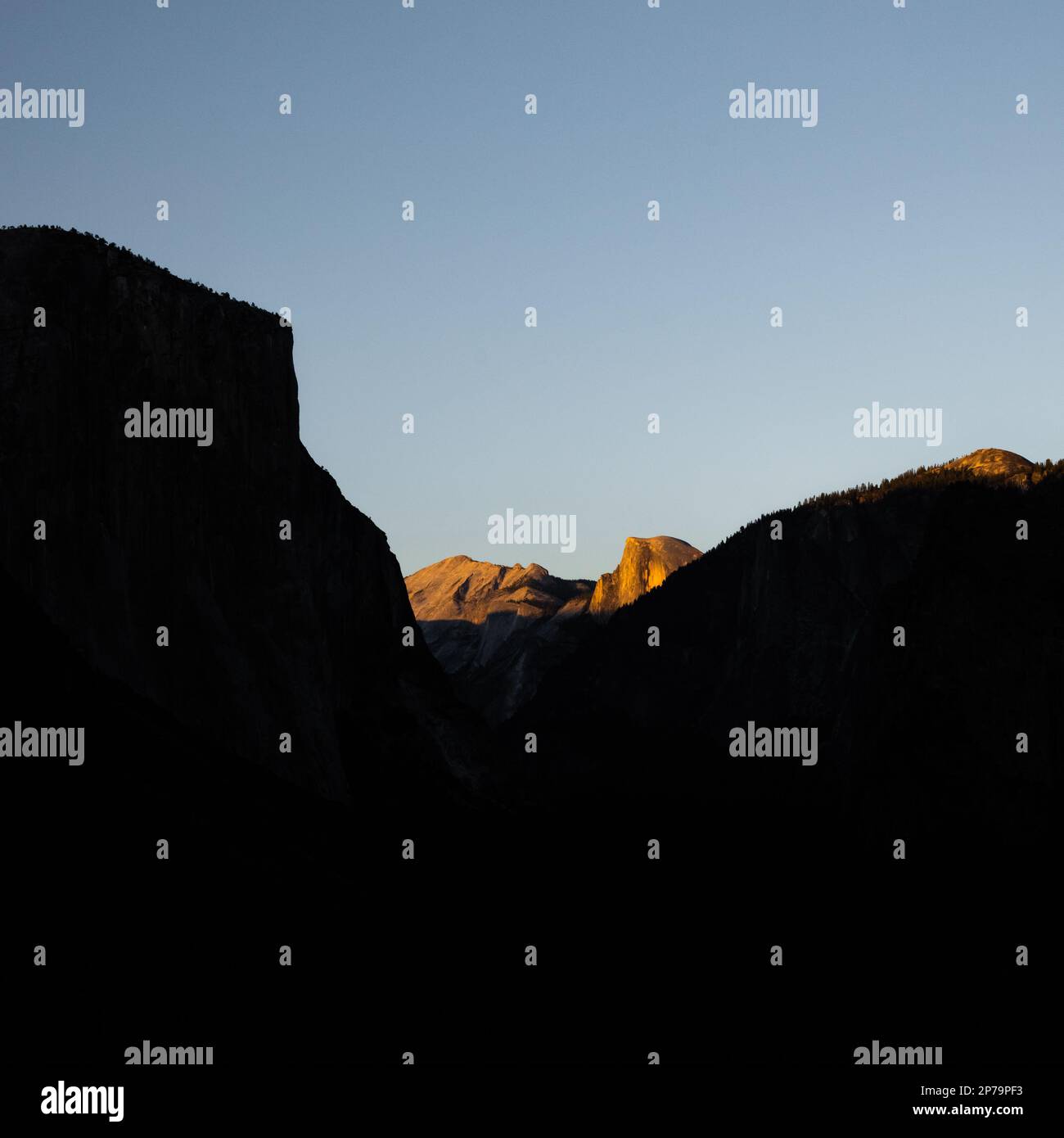 Evening Lights up Half Dome with the valley in shadows in Yosemite ...