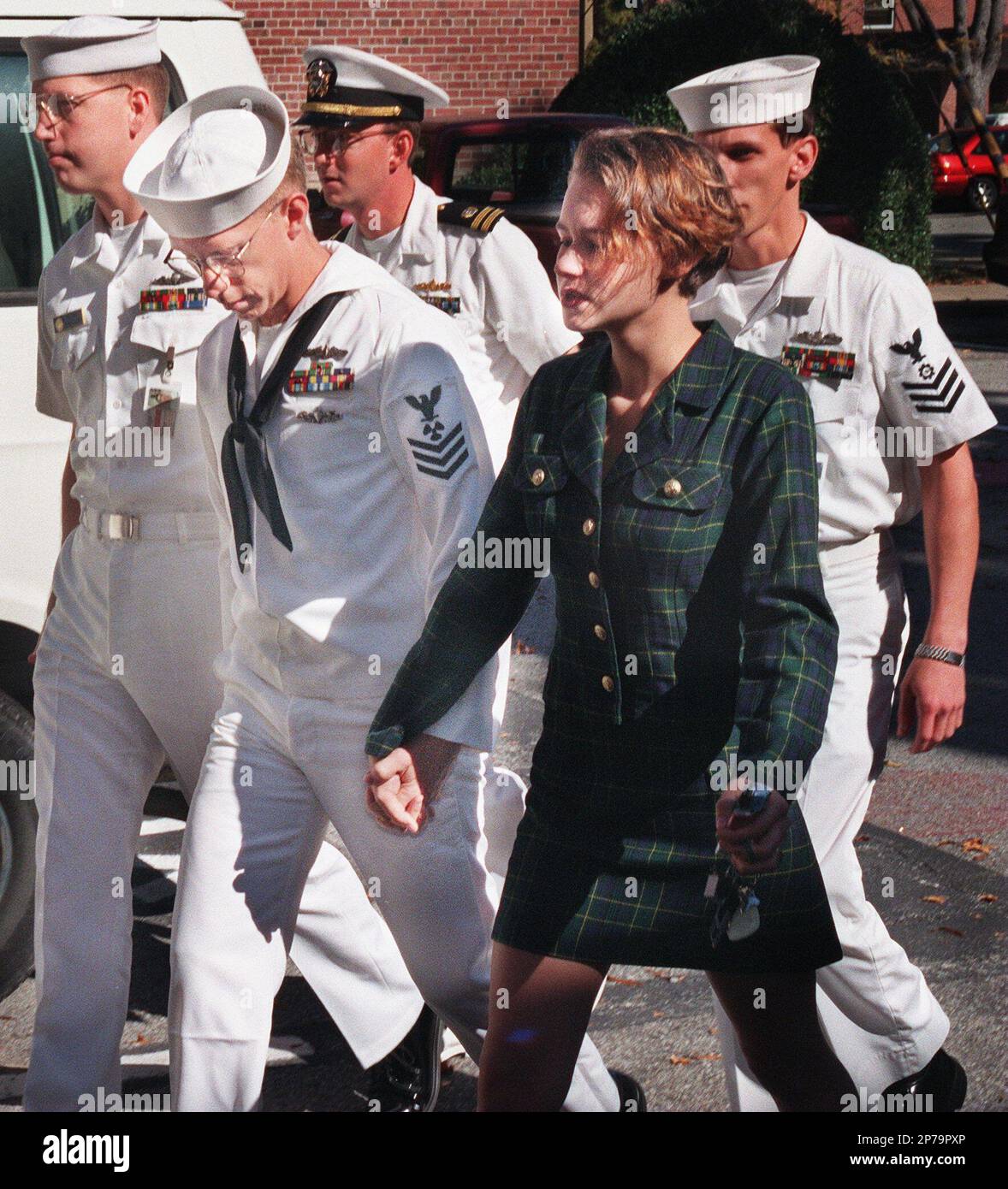 Petty Officer First Class Kurt G. Lessenthien, holding hands with his ...