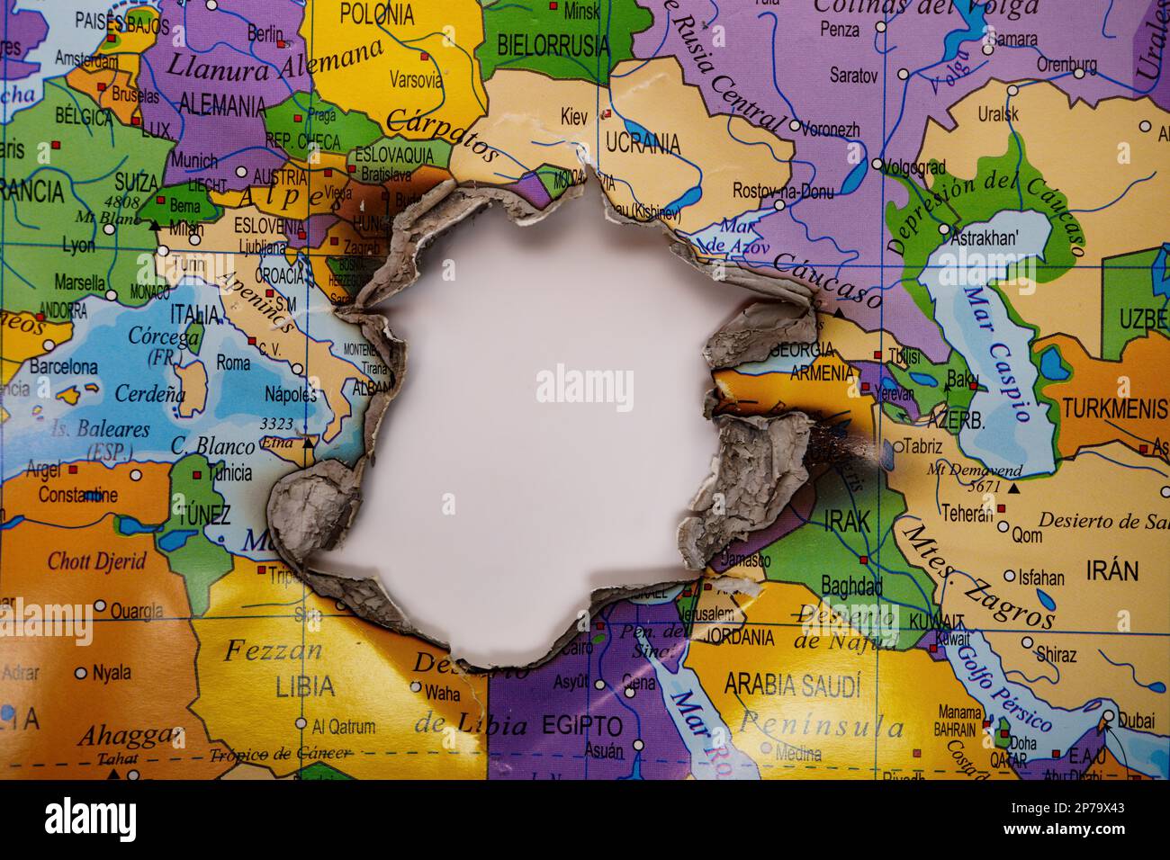 Close-up of a burned map of europe with ash residue in the copy space ...