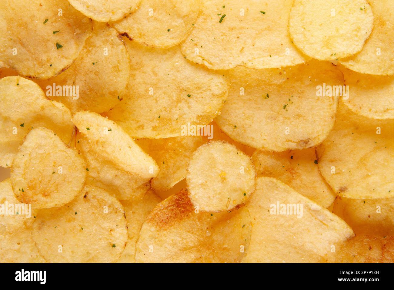 Potato chips texture background. Crispy and crunchy snack with a spicy ...