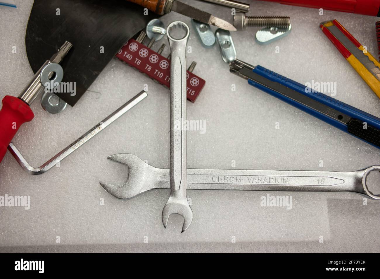 Messy tool desk top view scattered and unorganized work tools no people ...