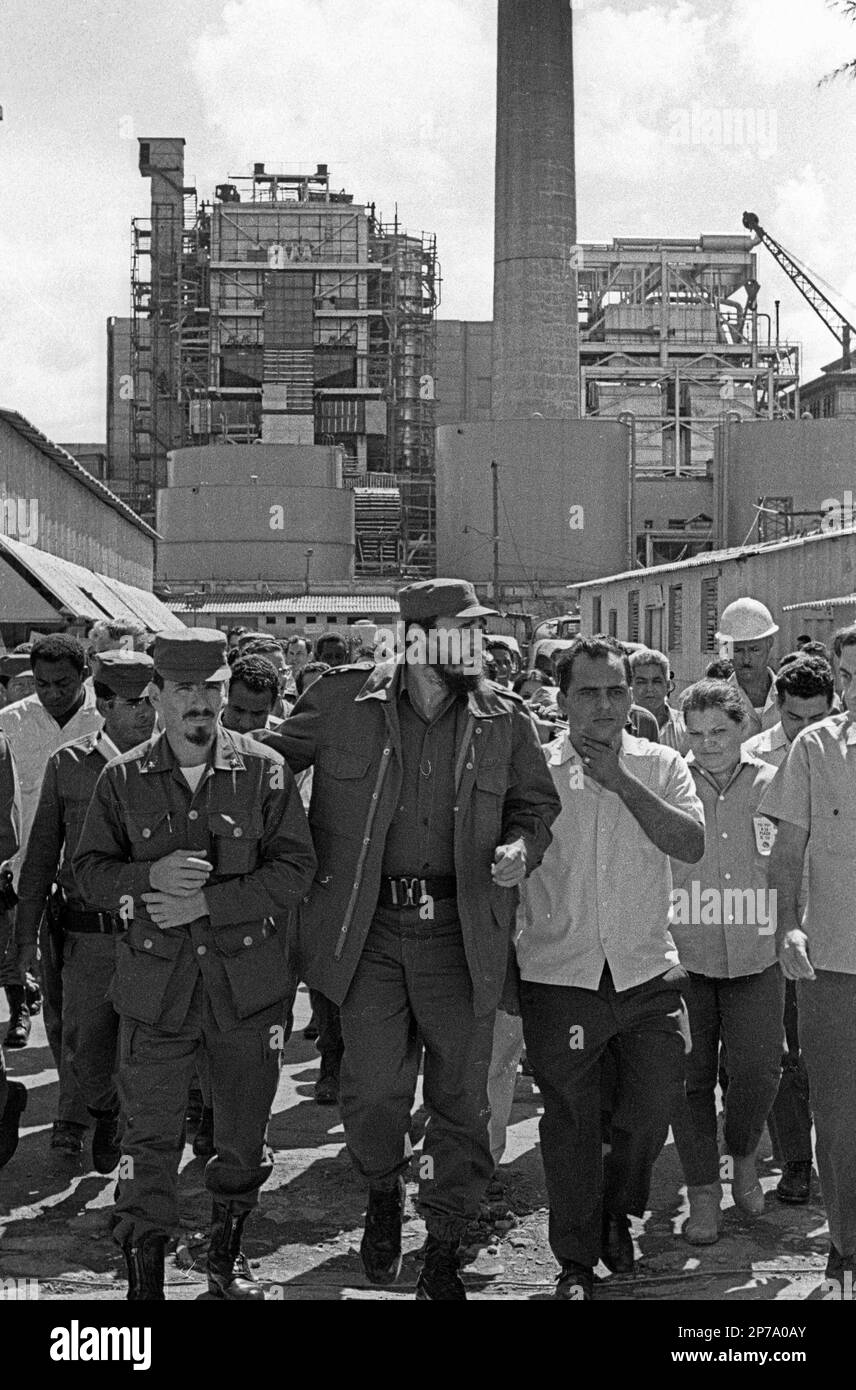 Cuban leader Fidel Castro, center, and commander of the Revolution ...