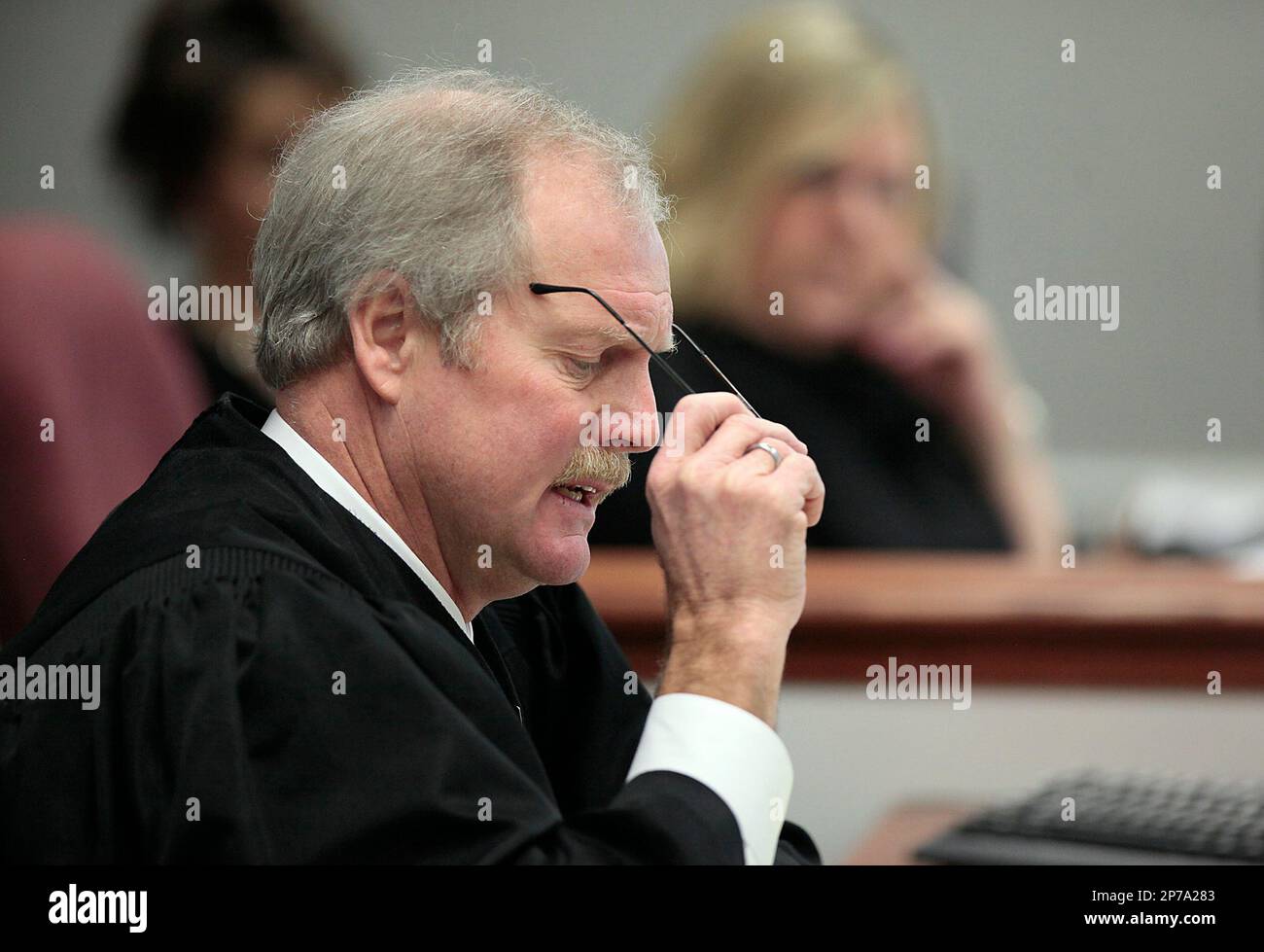 Judge James Updike speaks during the sentencing for former Chesapeake ...