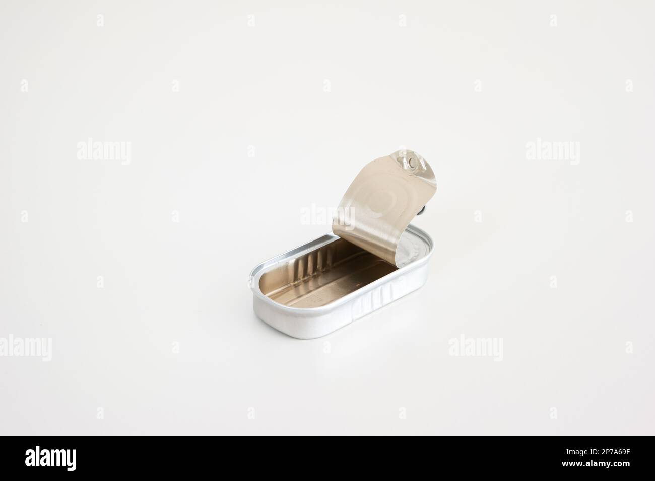 Opened empty fish tin can studio shot isolated on white top view Stock ...