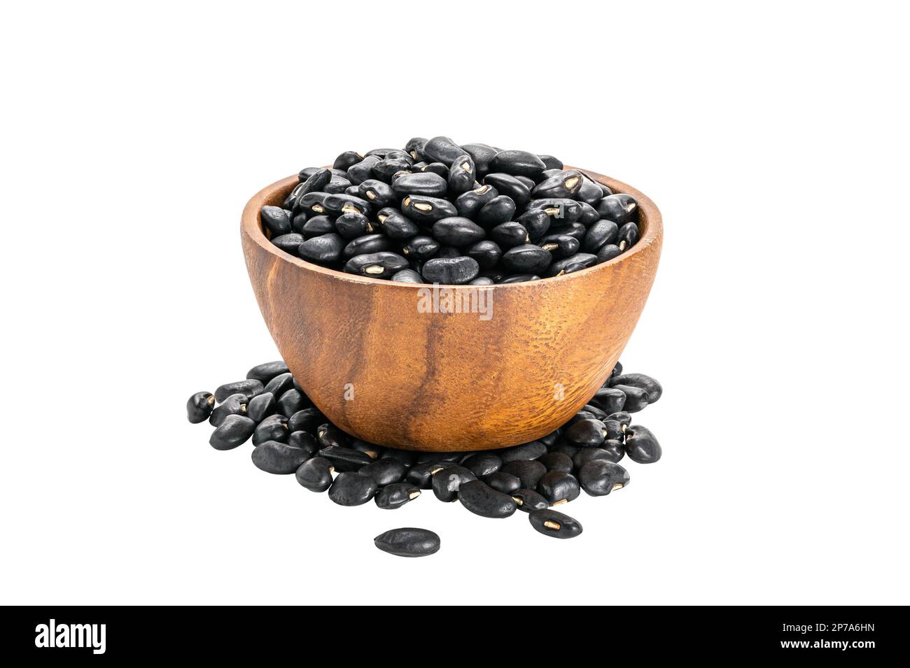 Side view of black beans in wooden cup on white background with ...