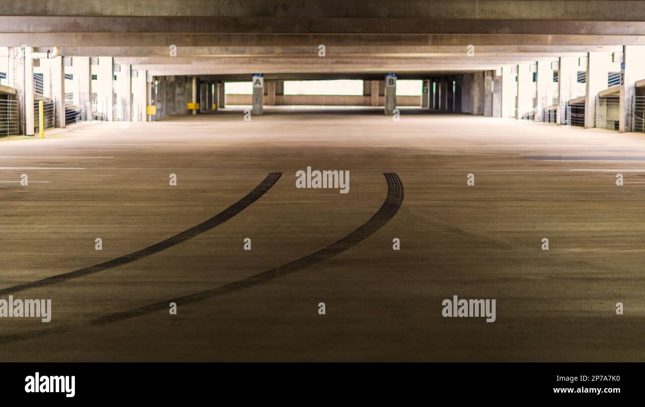 Tire Marks left in an Empty Parking Garage Stock Photo - Alamy