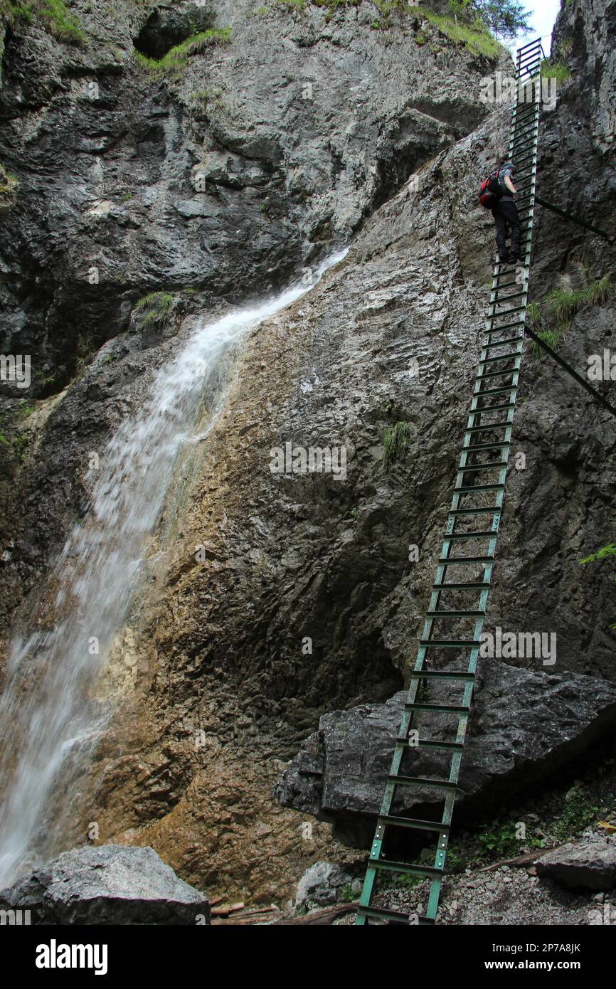 A tourist in the beautiful gorges of the Slovak Paradise National Park ...