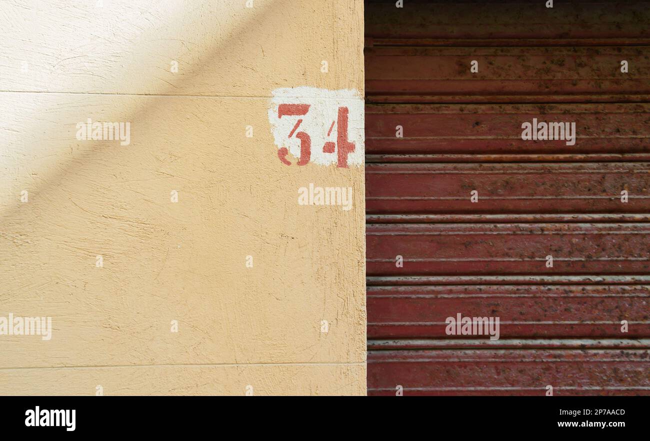 Information sign on the wall of building Stock Photo - Alamy