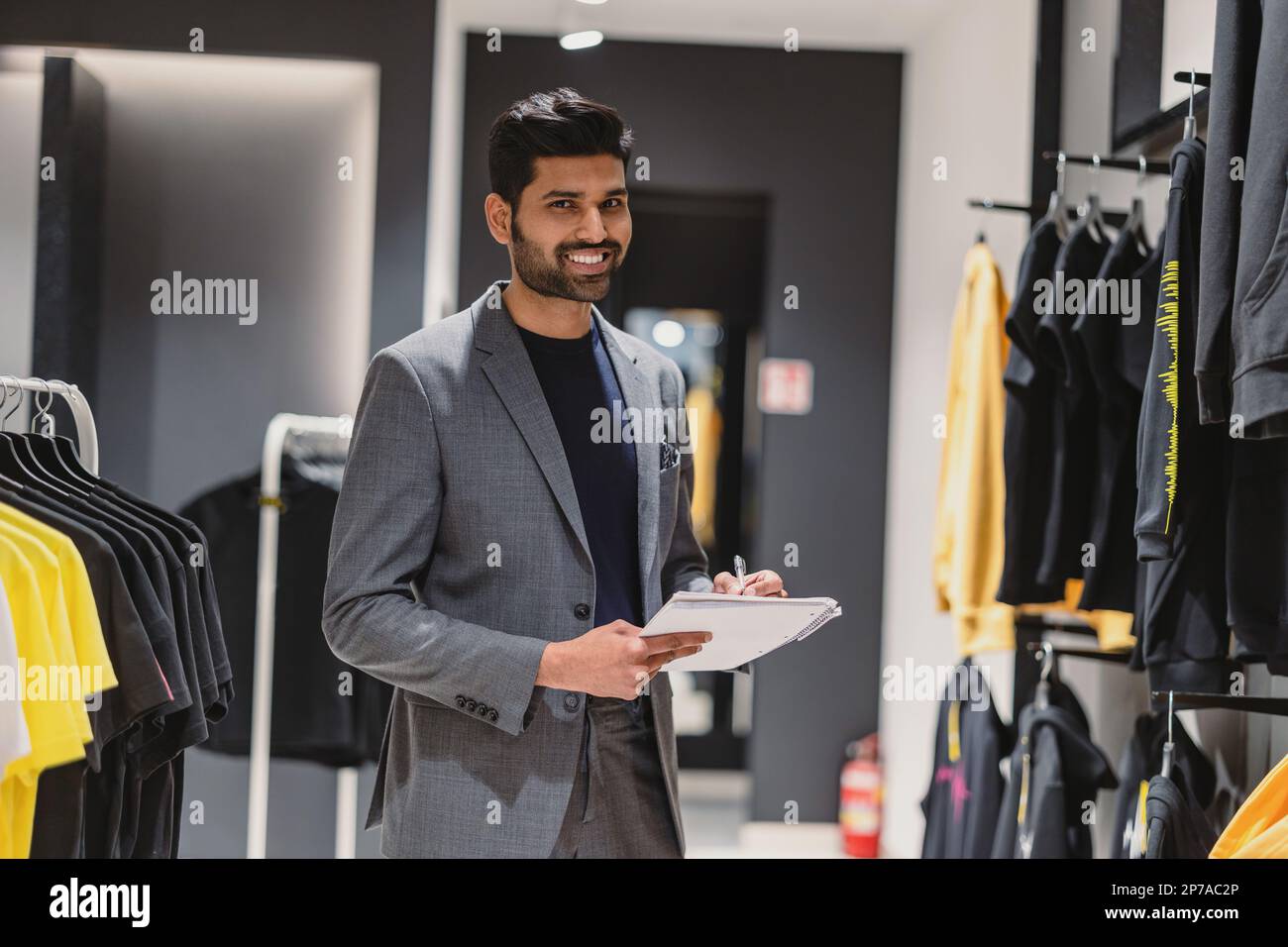 Male asian client clothing store hi-res stock photography and images ...
