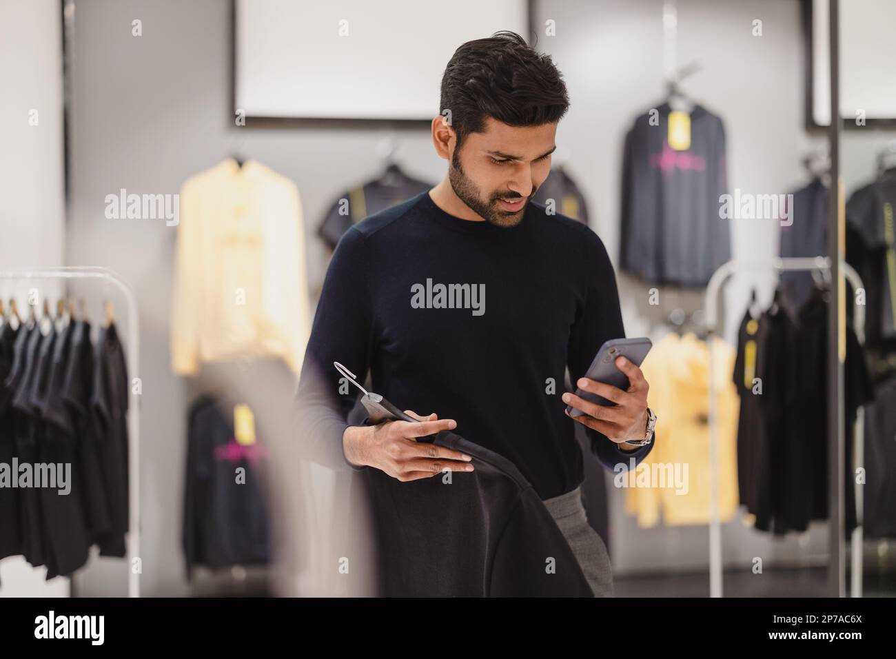 Male asian client clothing store hi-res stock photography and images ...