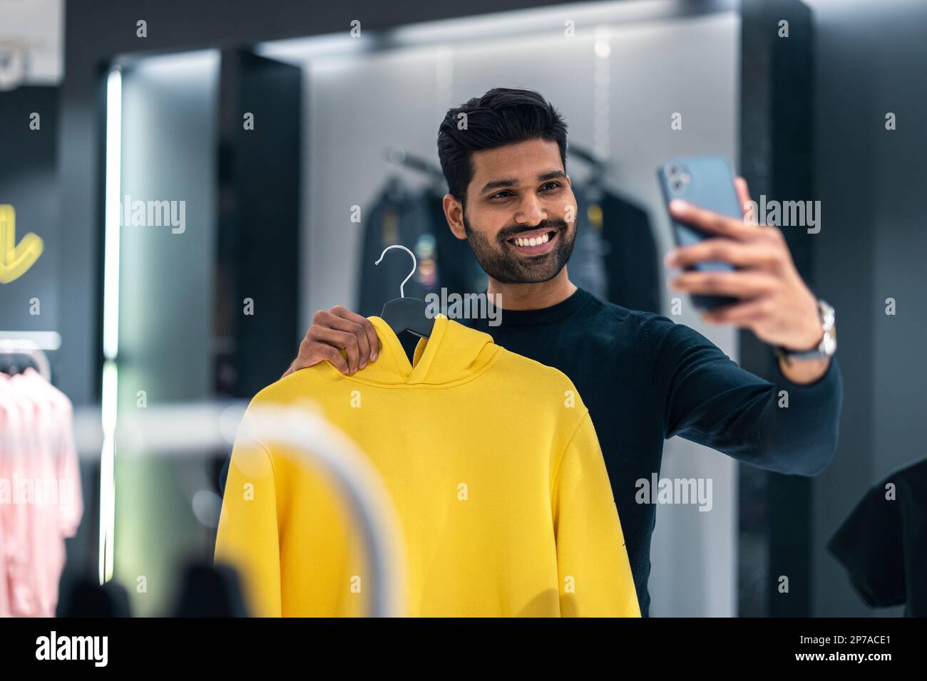 Male asian client clothing store hi-res stock photography and images ...