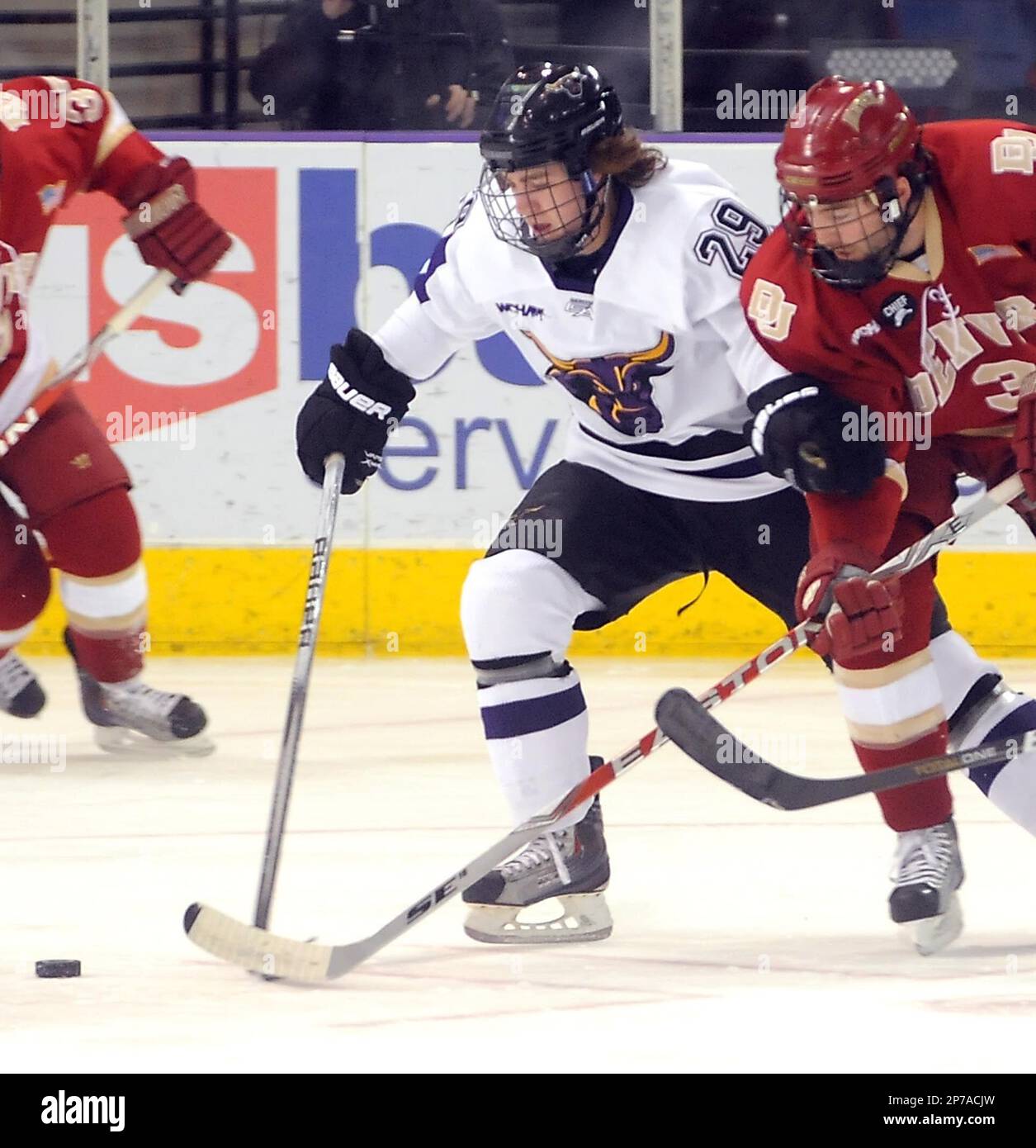 Minnesota State University, Mankato's Eli Zuck (29) and Denver's Jon ...