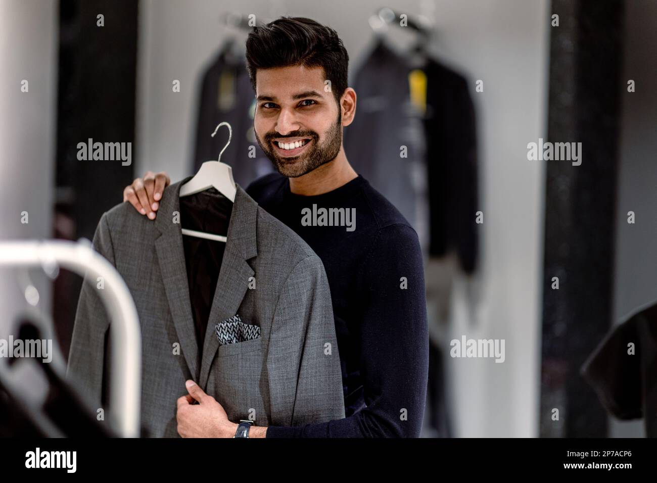 Male asian client clothing store hi-res stock photography and images ...