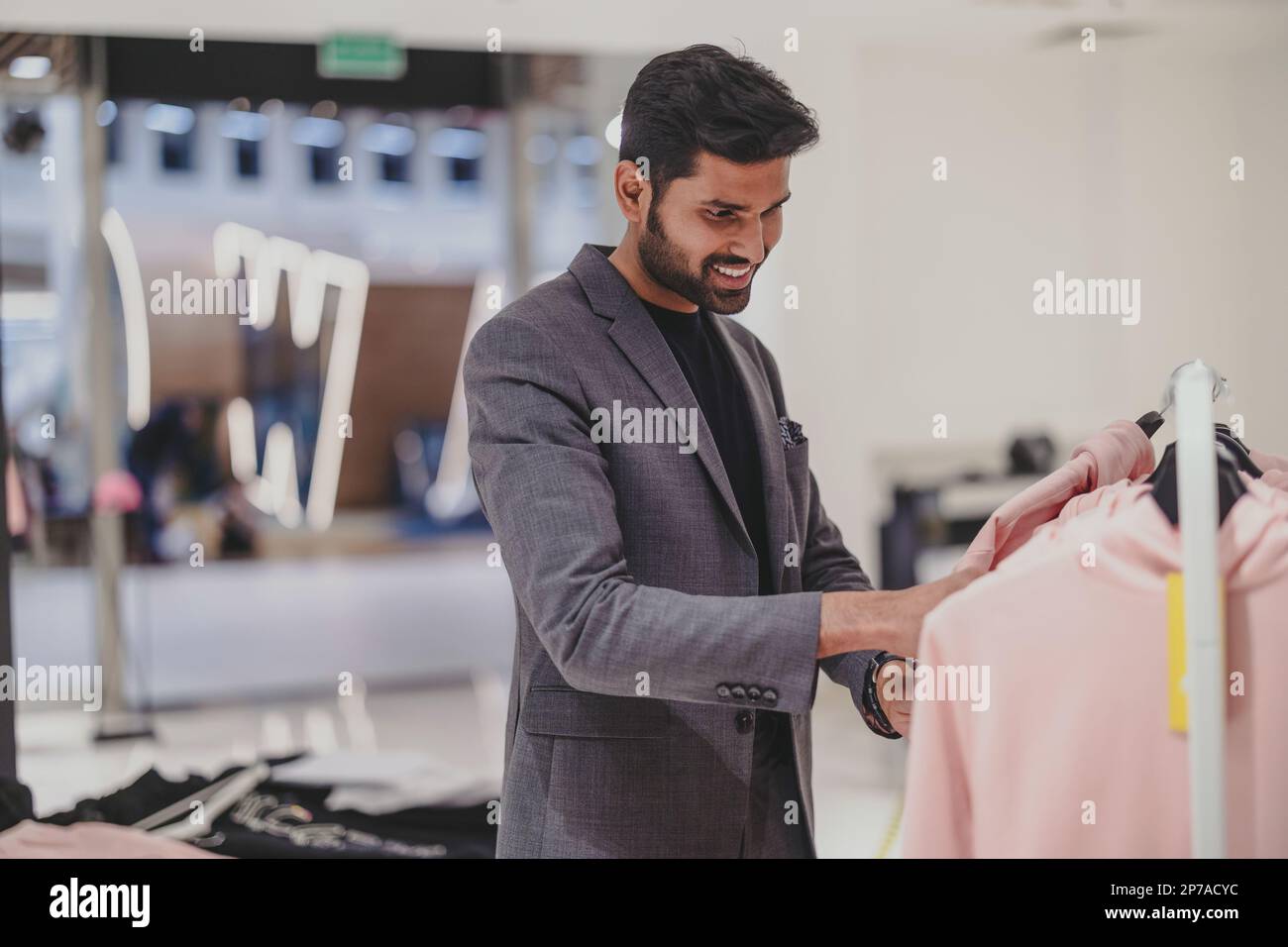 Male asian client clothing store hi-res stock photography and images ...