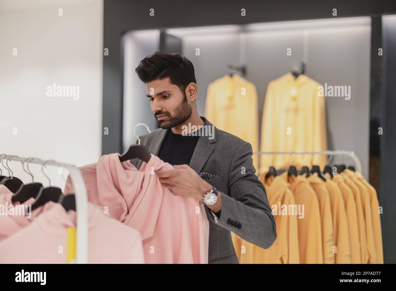 Male asian client clothing store hi-res stock photography and images ...