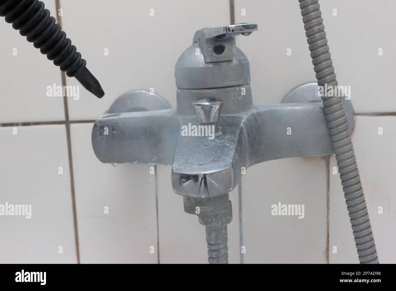 Steam cleaning bathroom faucet close hi-res stock photography and ...