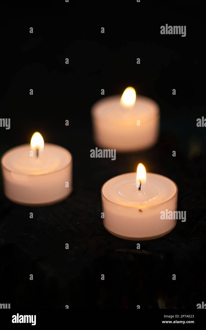 Small candles light up dark hi-res stock photography and images - Alamy
