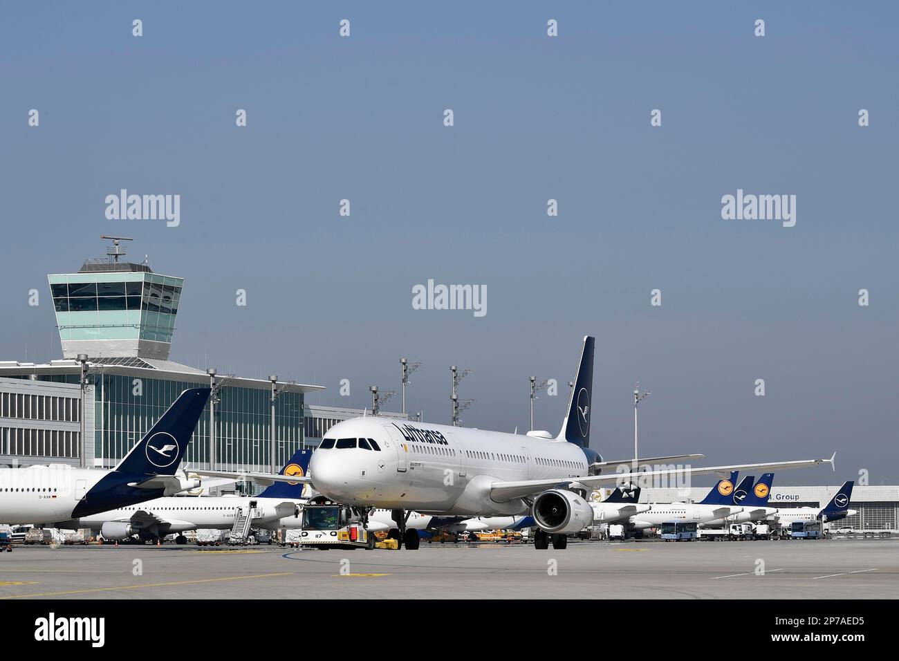 Lufthansa aircraft Airbus A321-200 with push-back truck in front of ...
