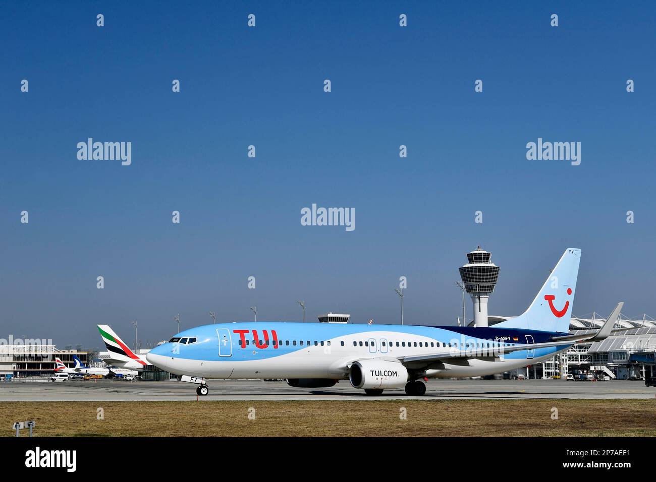 TUIfly Boeing B737-85 (WL) taxiing in front of Terminal 1 with tower ...