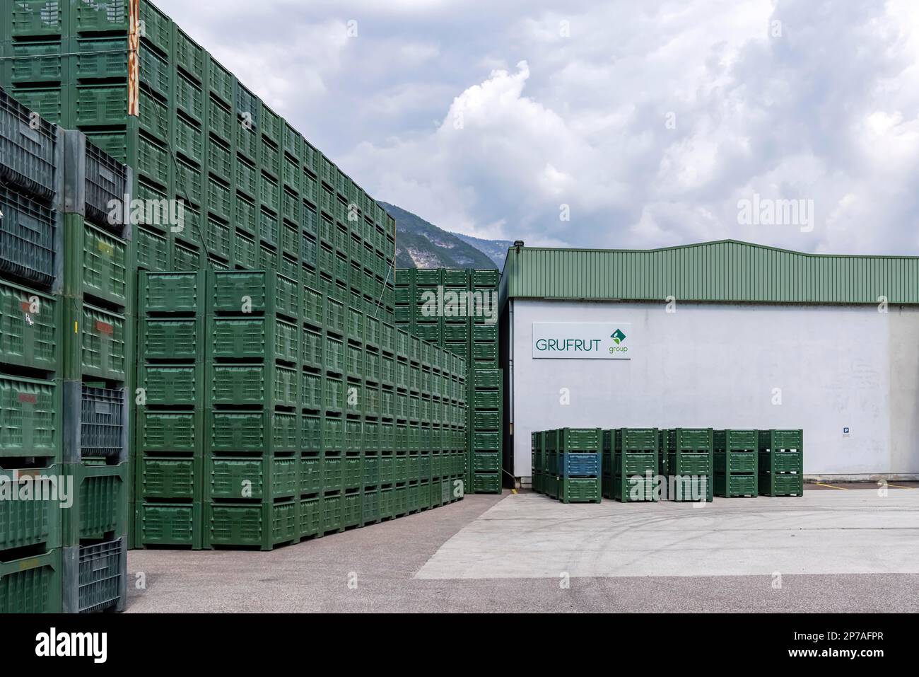 Vegetable crates and fruit boxes for the apple harvest pile up at the ...