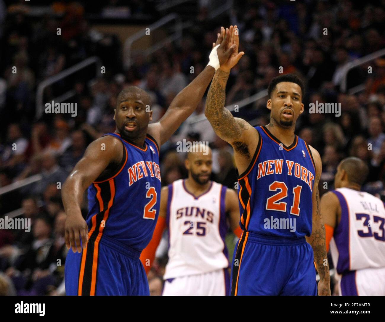 New York Knicks point guard Raymond Felton, left, and Wilson Chandler ...