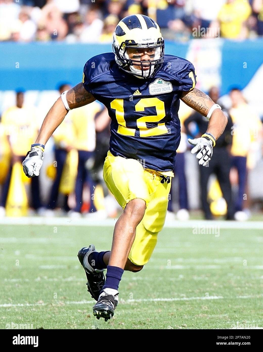 Michigan Wide Reciever (12) Roy Roundtree on a passing route in the ...