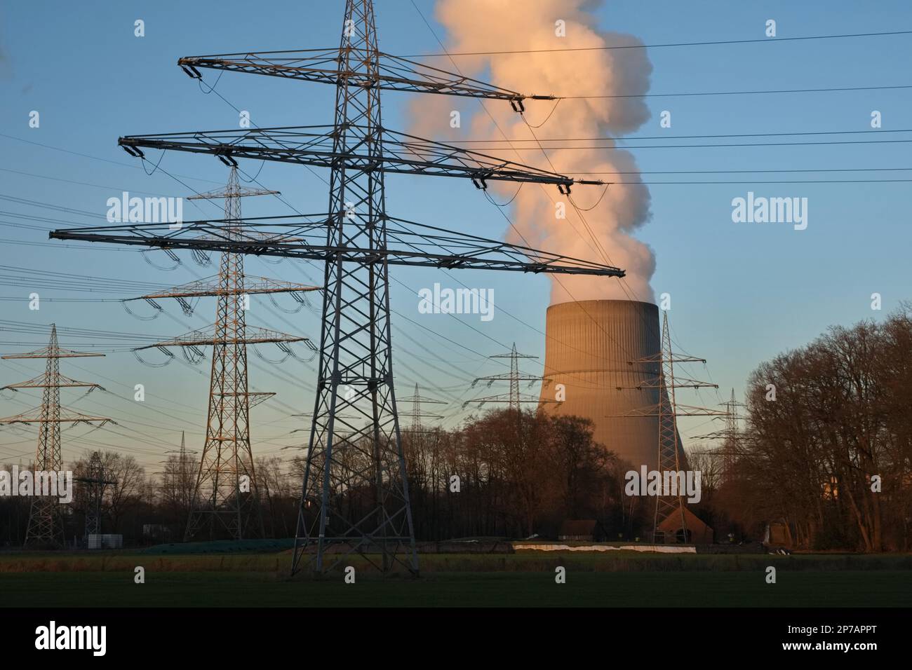 Hot steam comes out of a cooling tower, natural draught cooler, at the ...